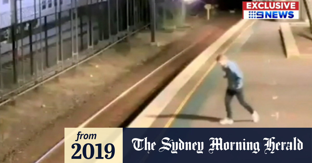 Video Stranger Pulls Man Away From Oncoming Train